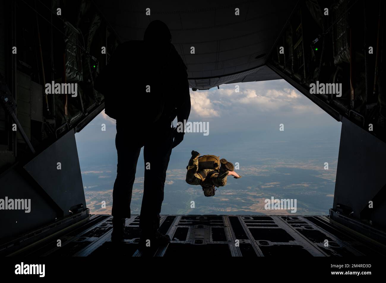 U.S. Special Operations members preform a high altitude low opening ...