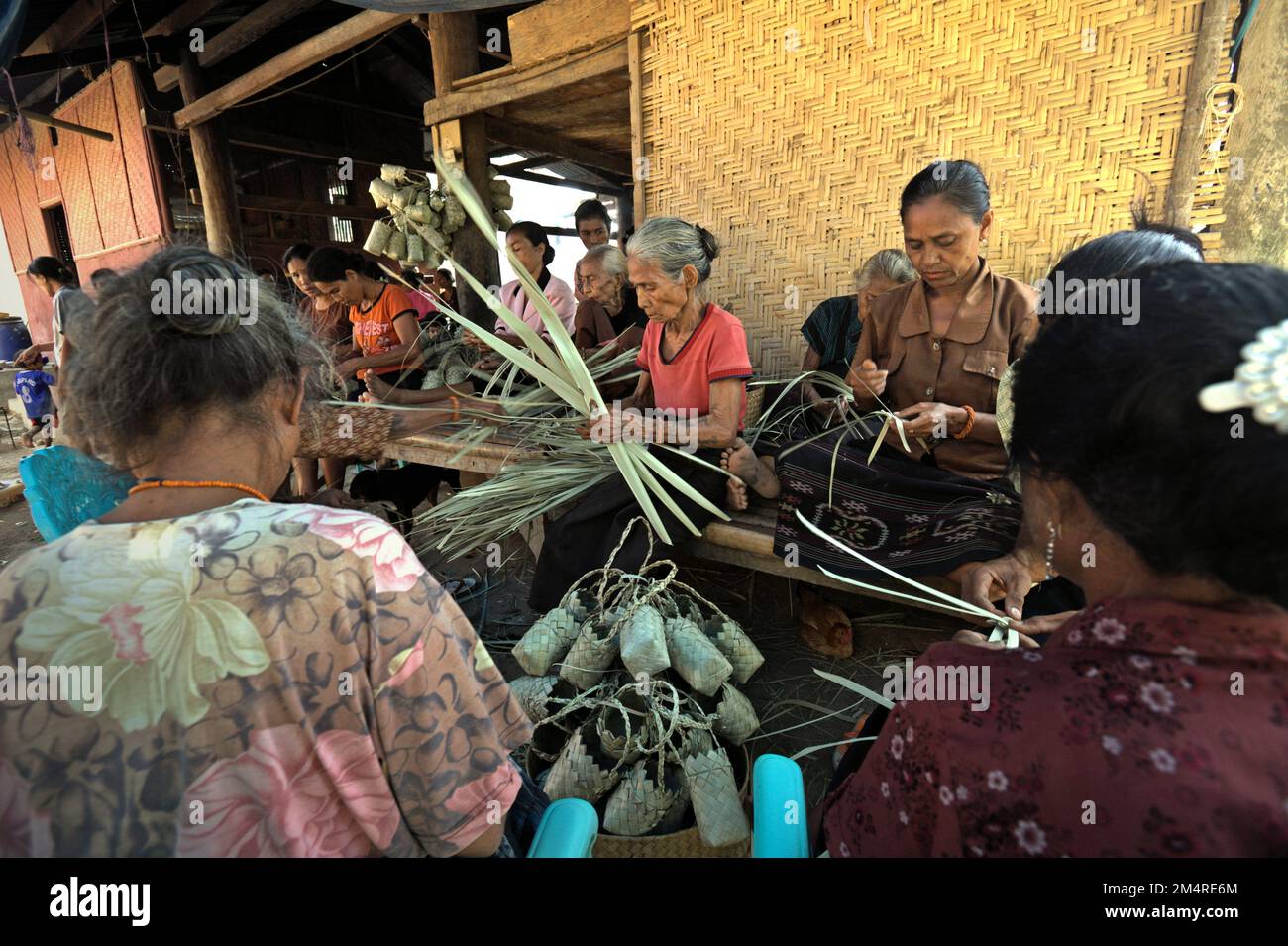 Women crafting souvenir bags for visitors, before the pre-marriage ...