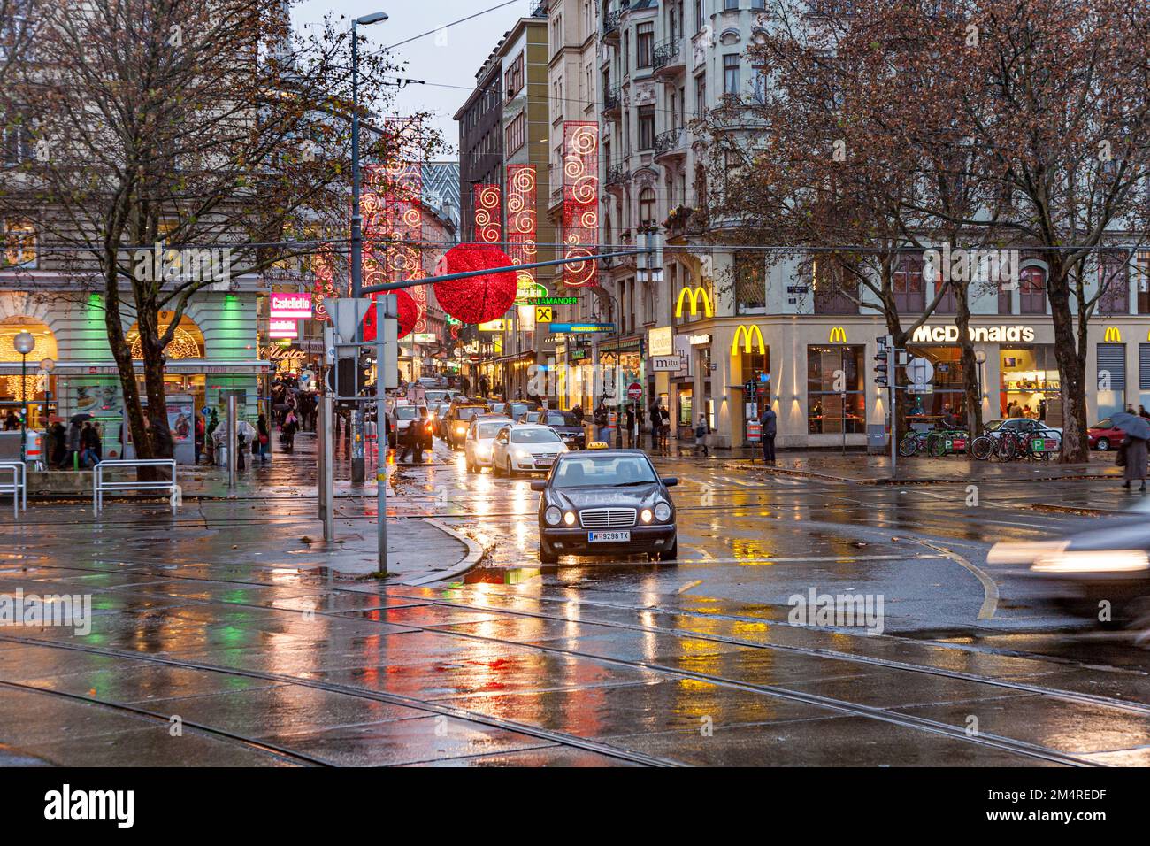 Vienna, Austria - December 9, 2009: rainy weather in the evening with ...