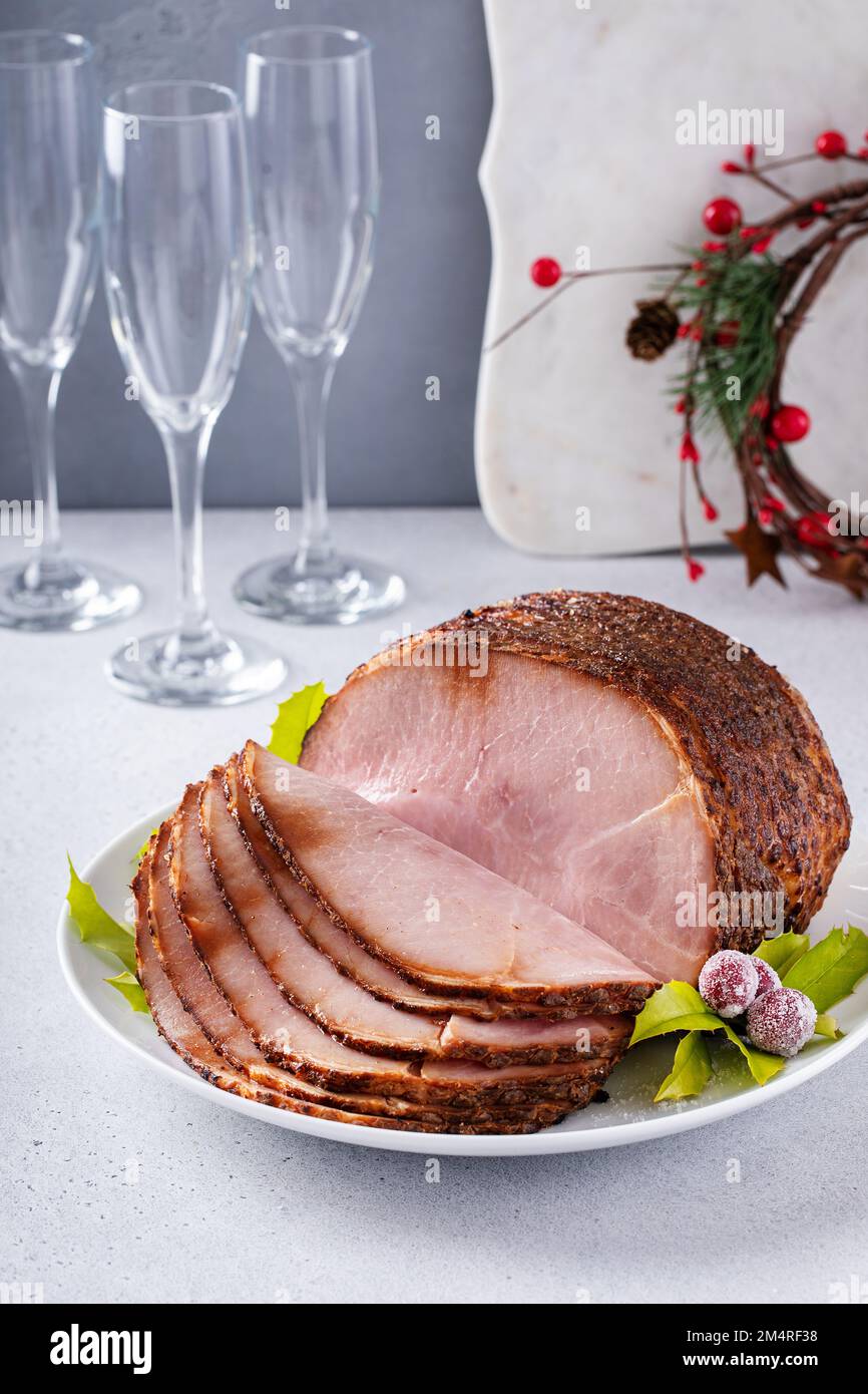 Christmas ham for celebration dinner, spiral sliced ham on a serving ...