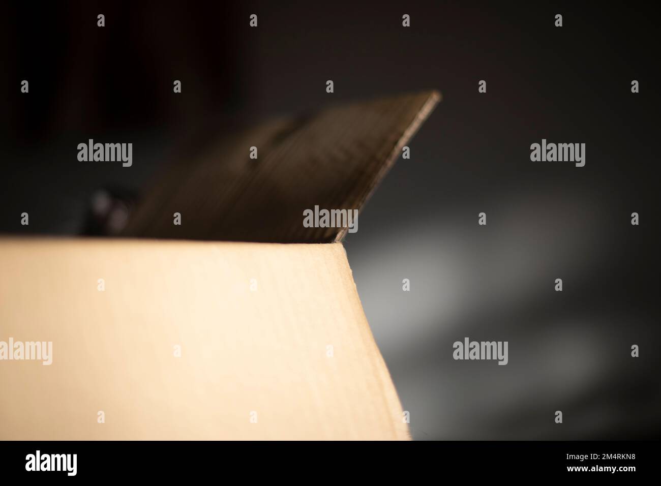 Cardboard box. Cardboard in room. Box for things. Interior details ...