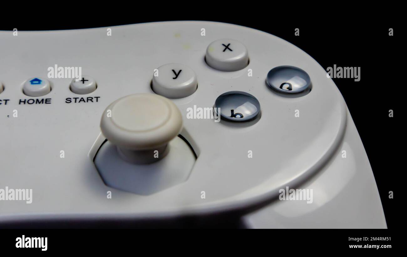 white joystick isolated on black background Stock Photo - Alamy