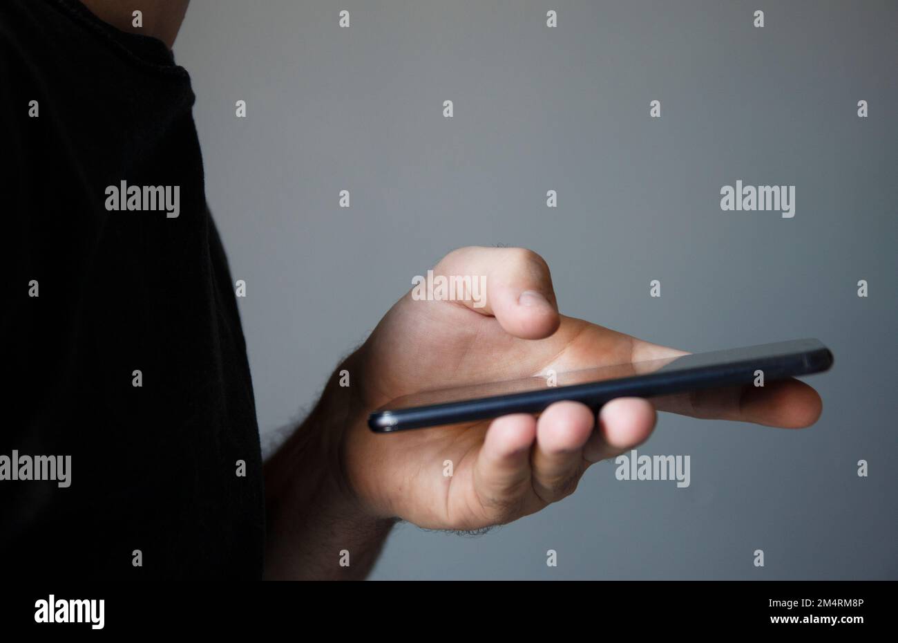 A man pointing out his finger to the blank screen of the modern ...