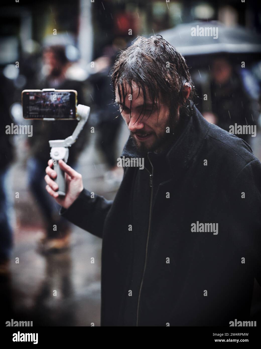 A man live streaming a freedom protest in Melbourne Stock Photo - Alamy