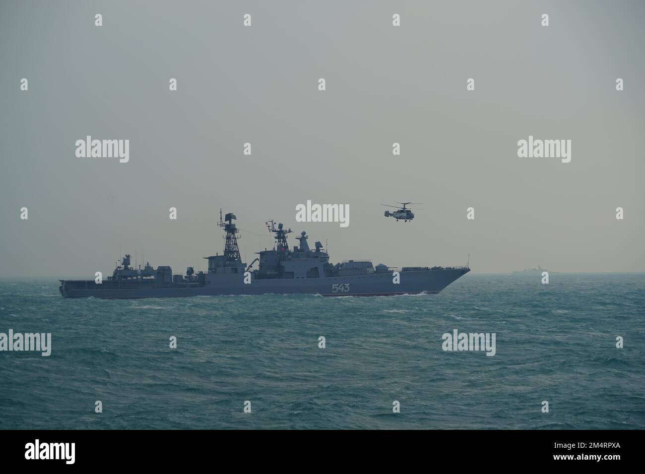 Aboard Destroyer Jinan, Joint Sea 2022. 21st Dec, 2022. A helicopter of ...
