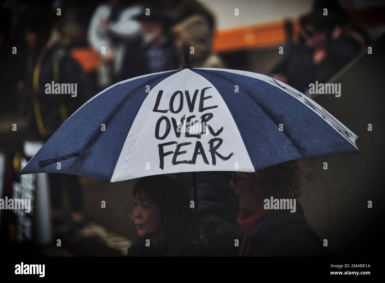 An aerial view of people carrying signs in a freedom protest in ...