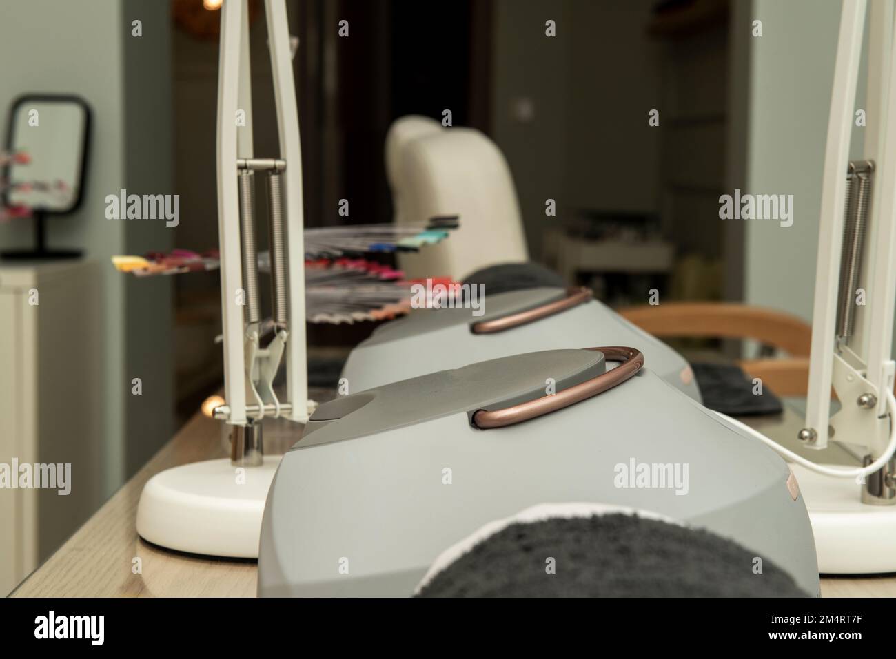 Machines for drying nail polish in a beauty salon Stock Photo - Alamy