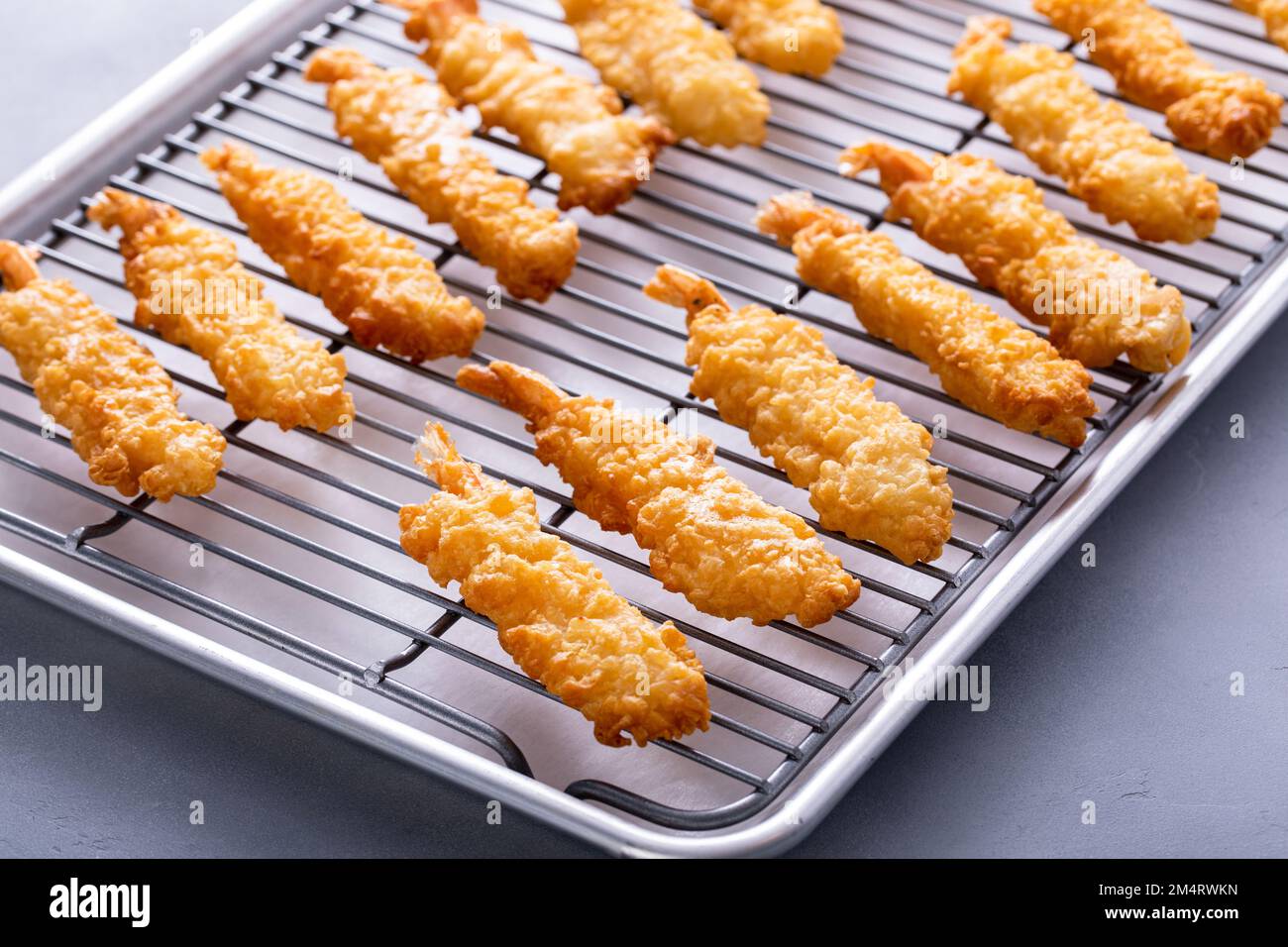 Tempura shrimp just cooked on a cooling rack ready to be served Stock ...