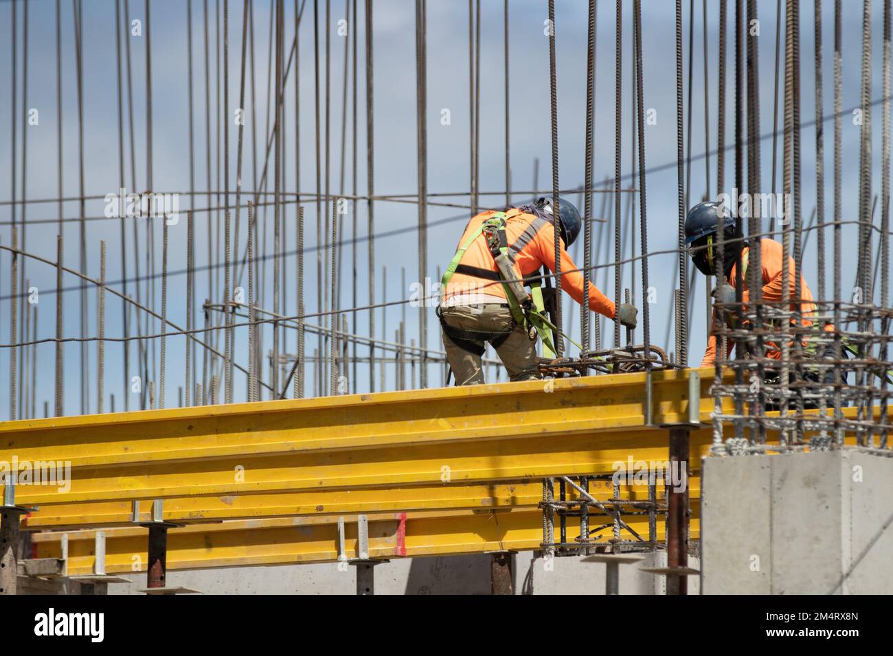 A closeup view of construction workers working on a building in San ...
