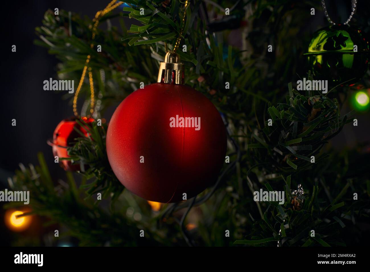 Christmas balls red color on the Christmas trees Stock Photo - Alamy