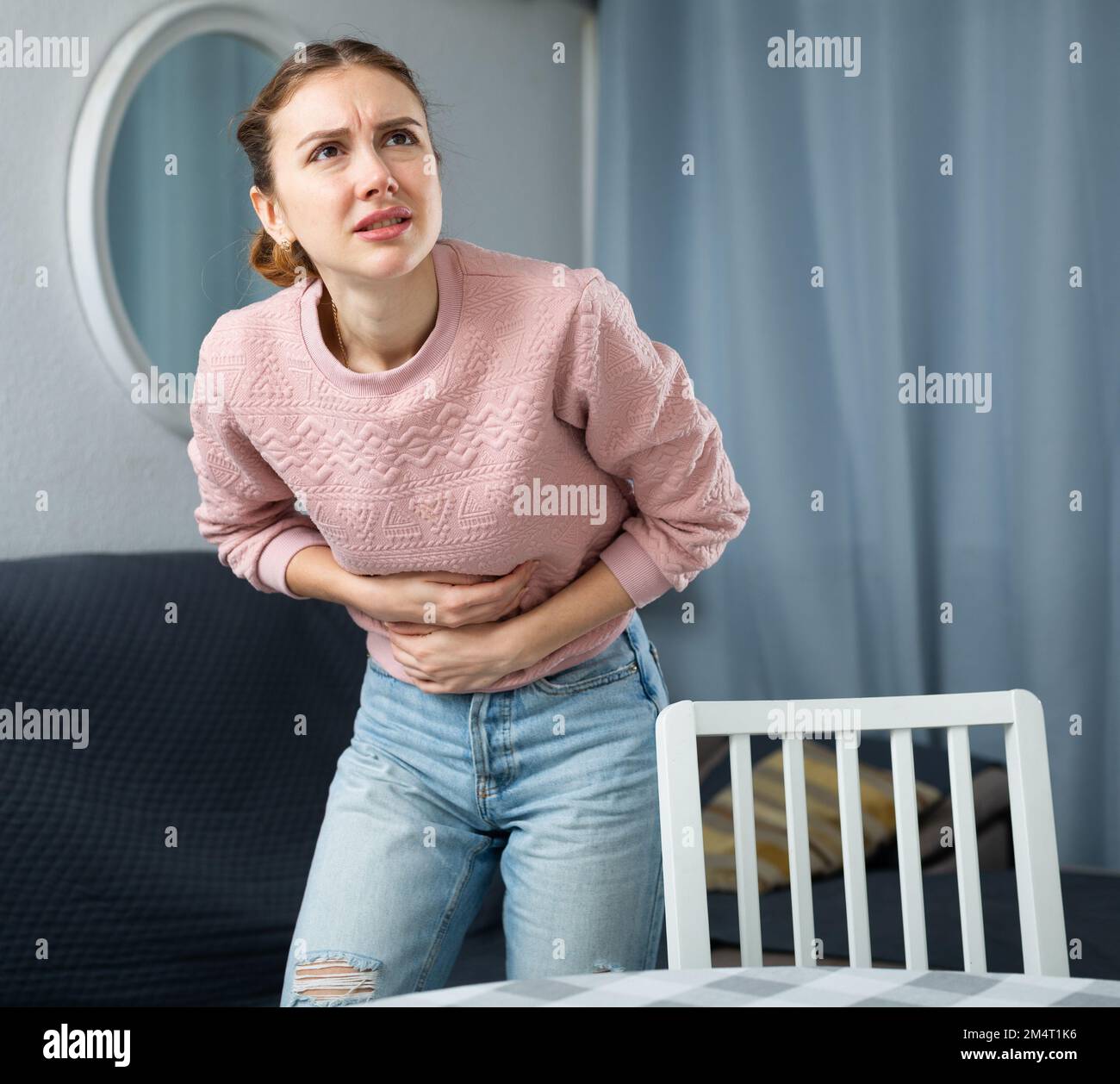 Woman diarrhea constipation holding hi-res stock photography and images ...