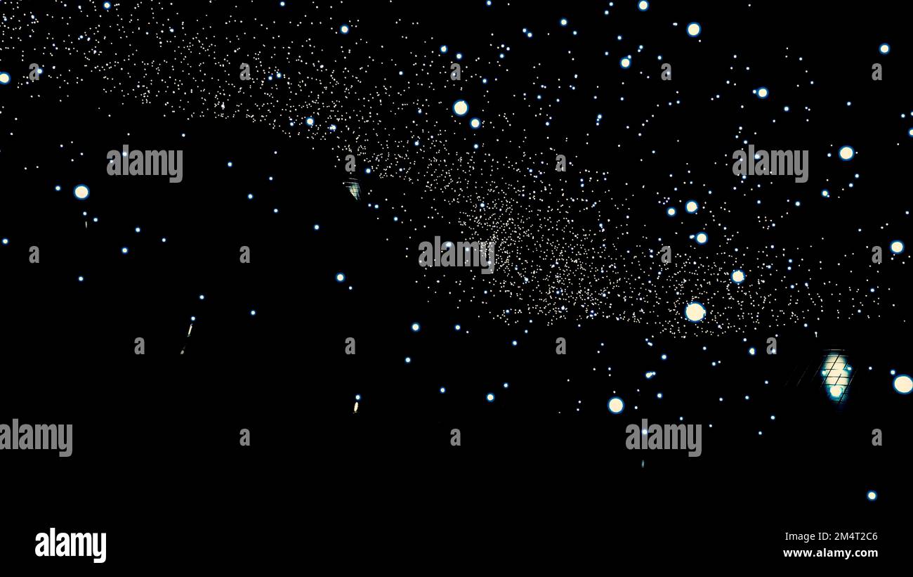 Dark background. Design.Small round particles in cartoon animation ...