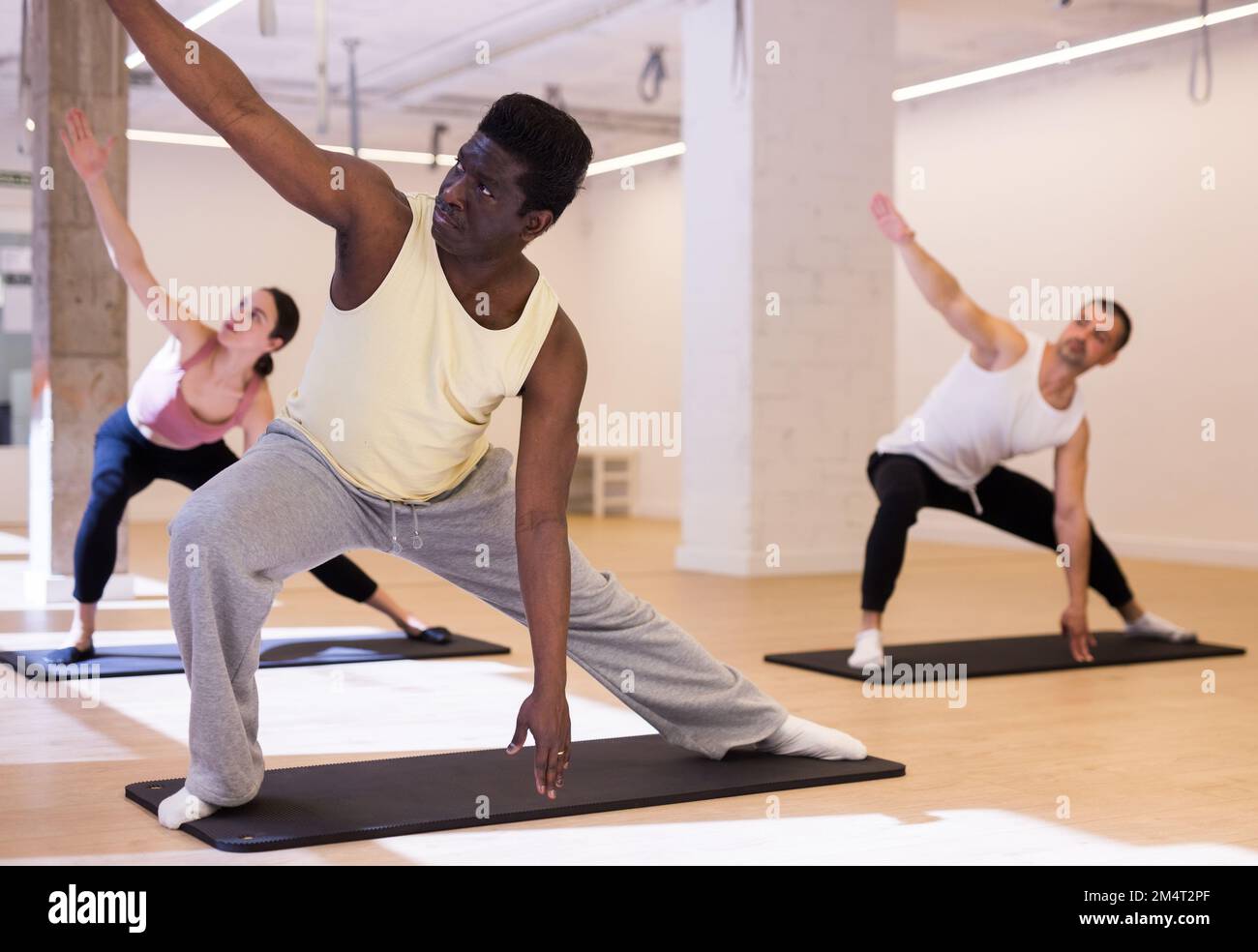 Afro man doing yoga hi-res stock photography and images - Alamy