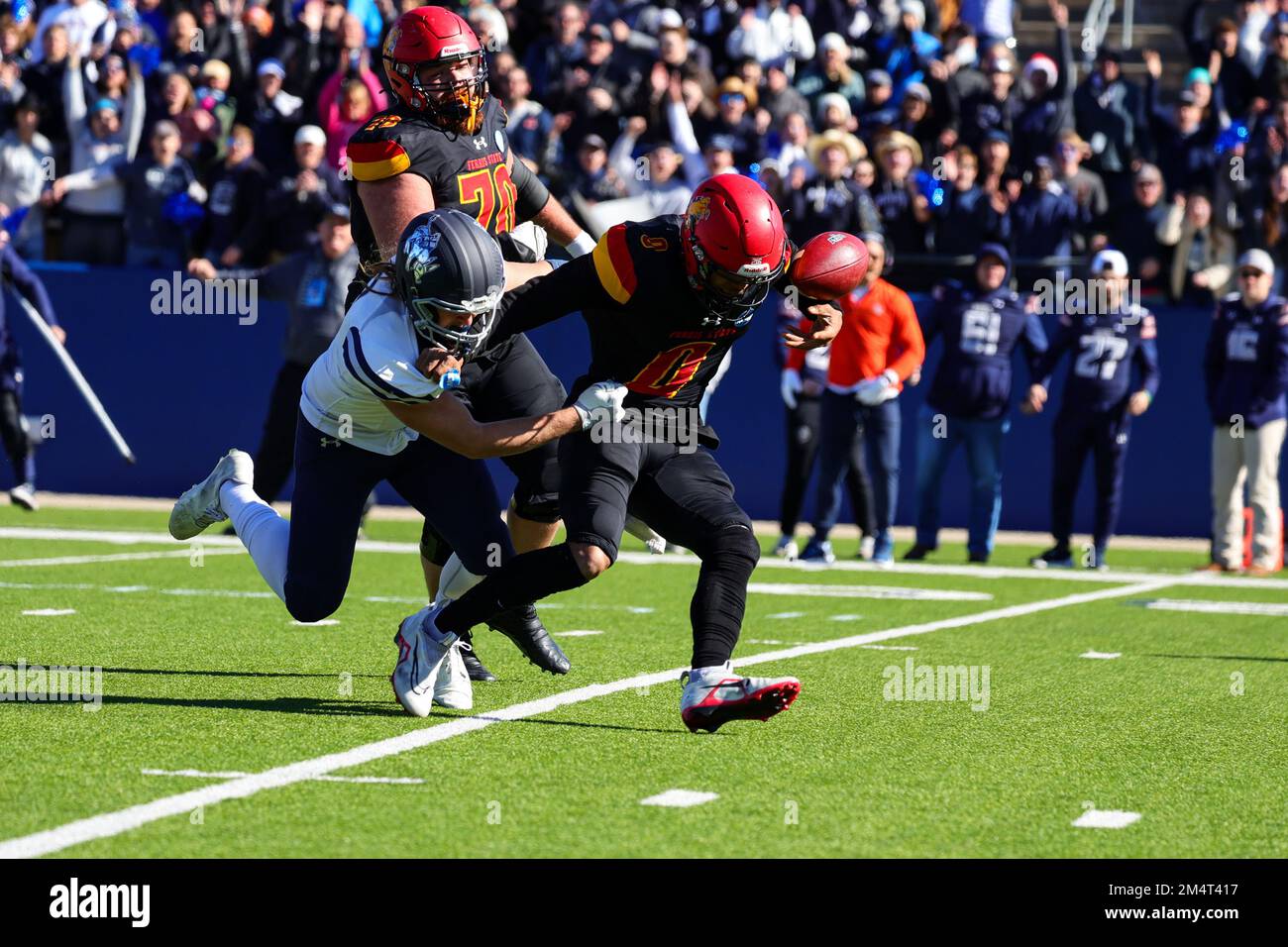 Ferris State Bulldogs quarterback Mylik Mitchell (0) loses the handle ...
