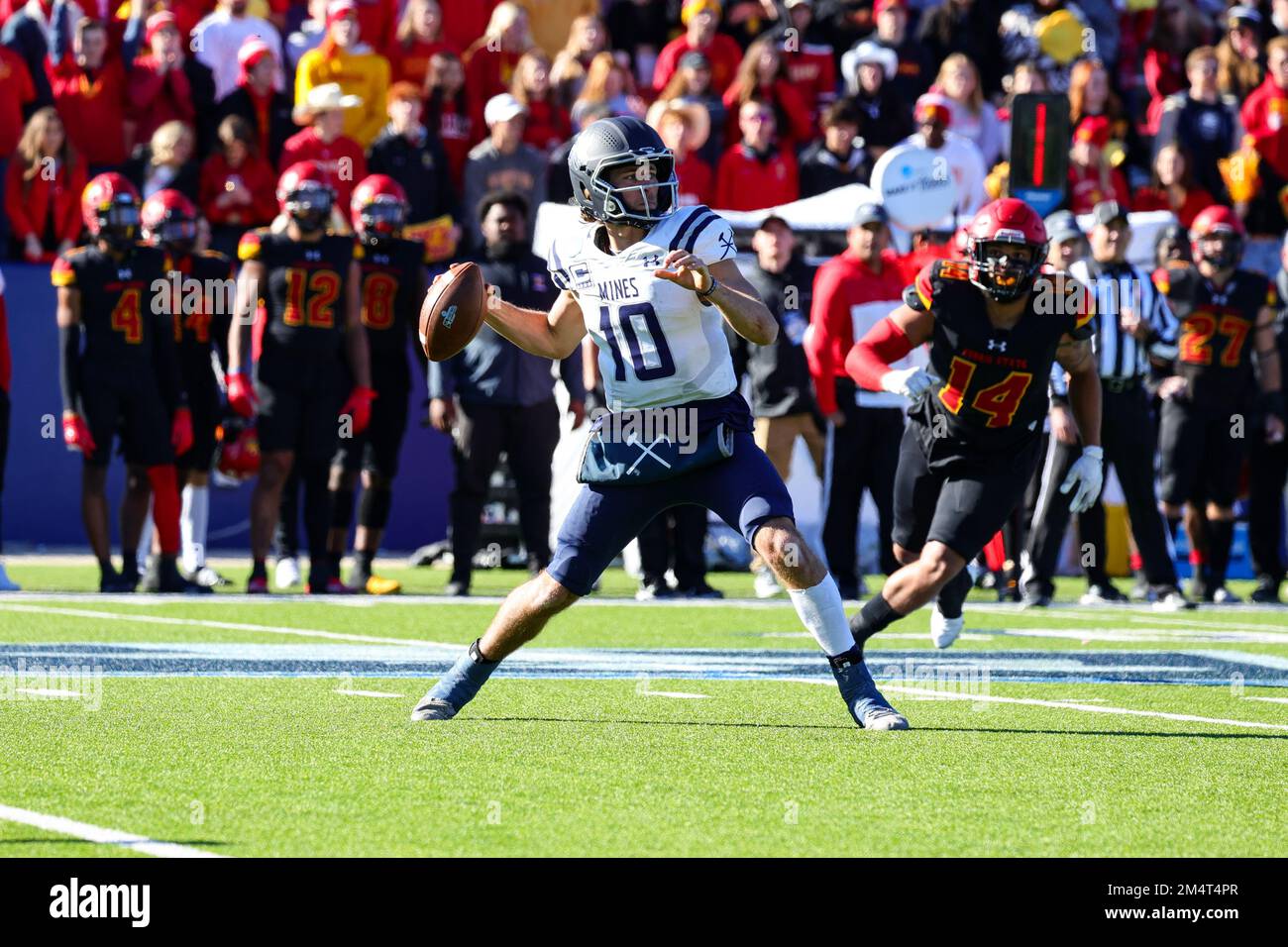 Colorado School of Mines Orediggers quarterback John Matocha (10) drops ... Colorado School of Mines Orediggers quarterback John Matocha (10) drops ...