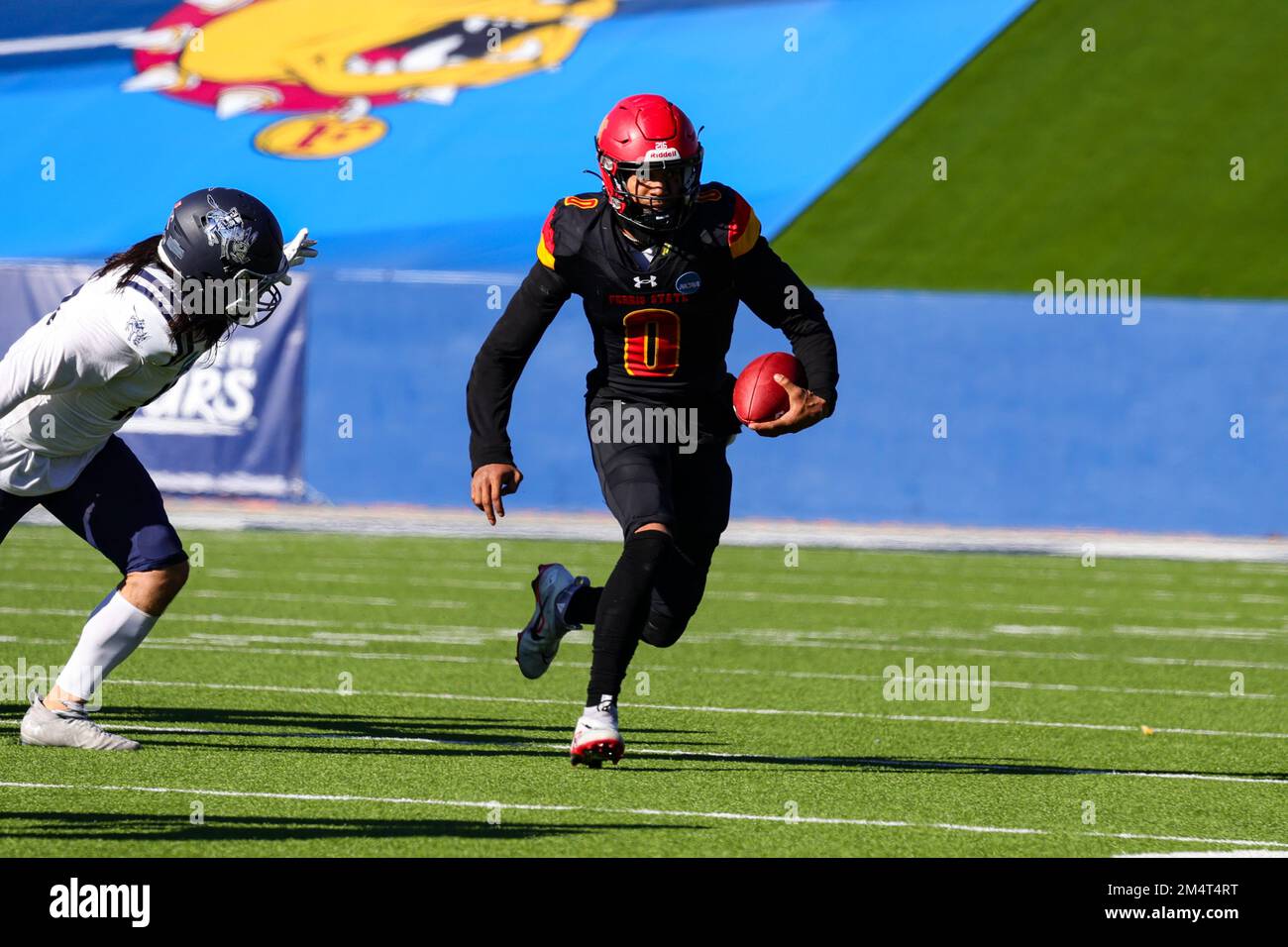 Ferris State Bulldogs quarterback Mylik Mitchell (0) runs for 6-yards ...