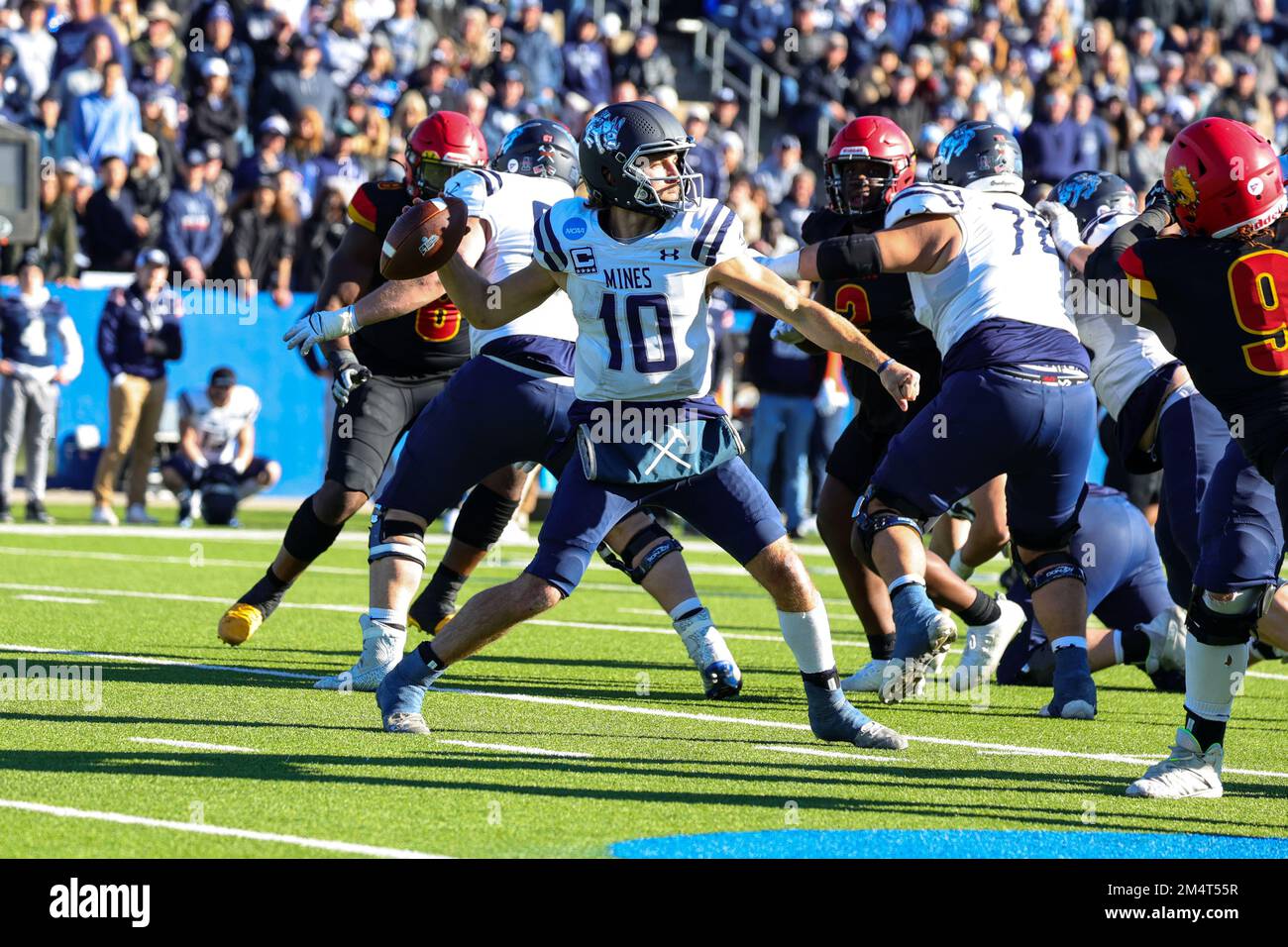 Colorado School of Mines Orediggers quarterback John Matocha (10) sets ...