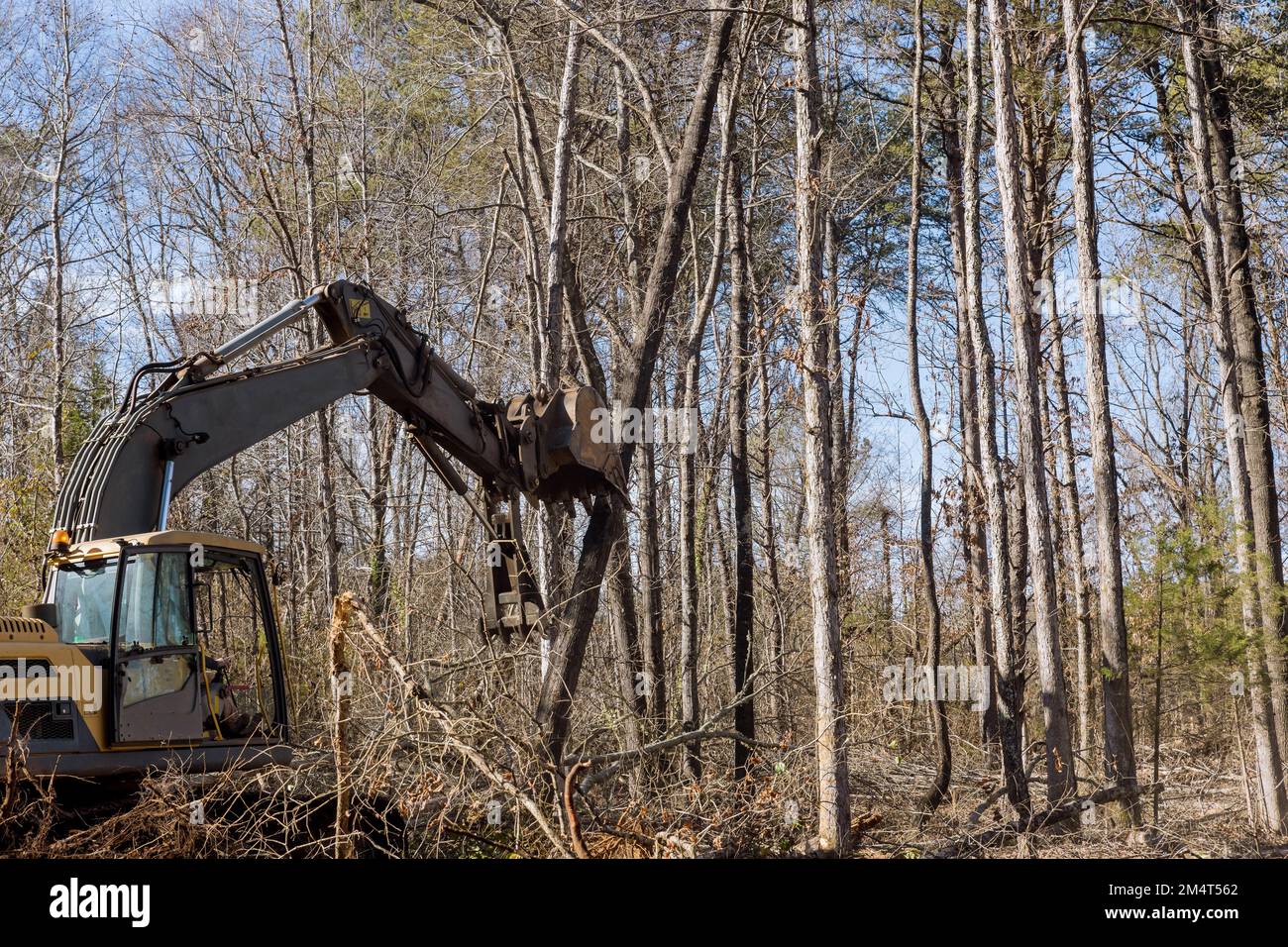 During construction process, tractor skid steers were used to clear ...