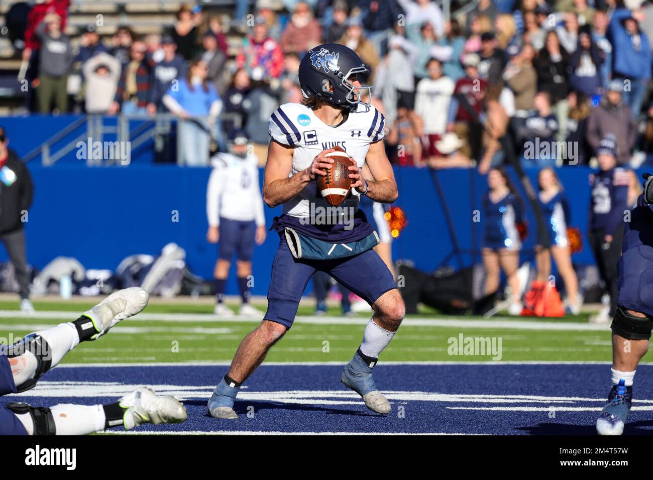 Colorado School of Mines Orediggers quarterback John Matocha (10) sets ...