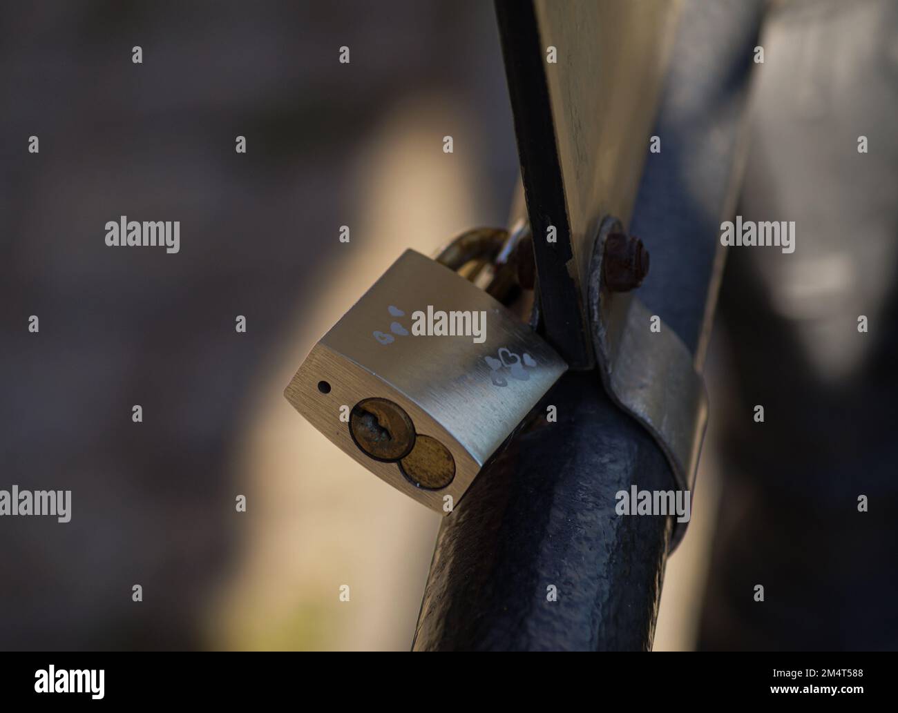 Small lock on a fence hi-res stock photography and images - Alamy