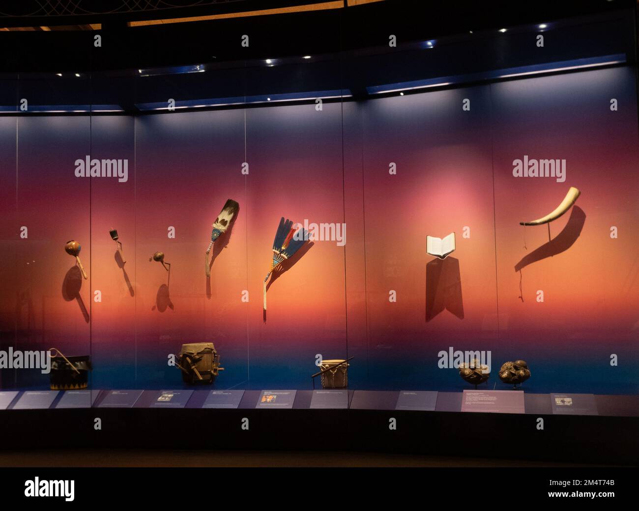 Display with traditional musical instruments including drums, horns ...