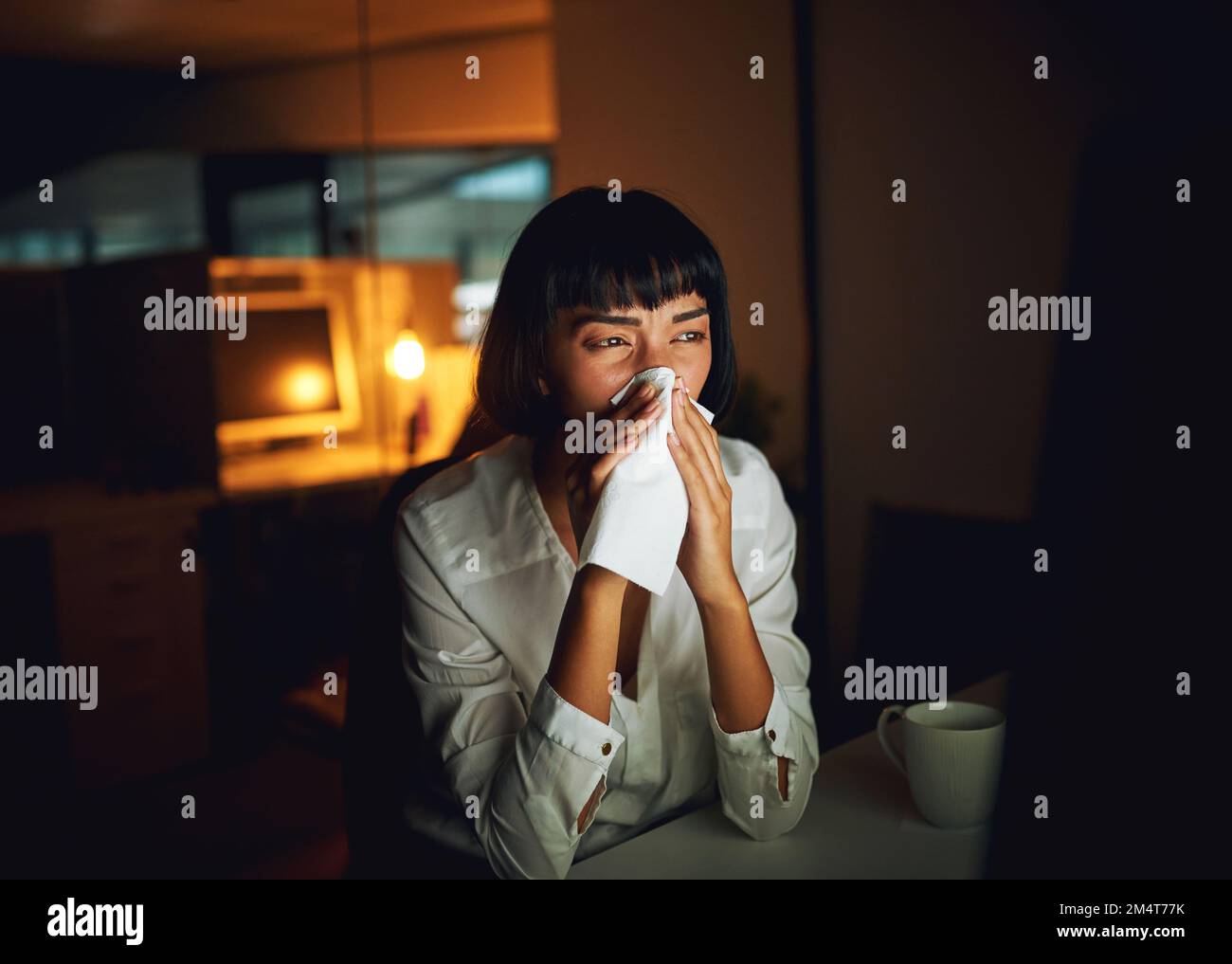 Making herself sick for the sake of success. a young businesswoman ...
