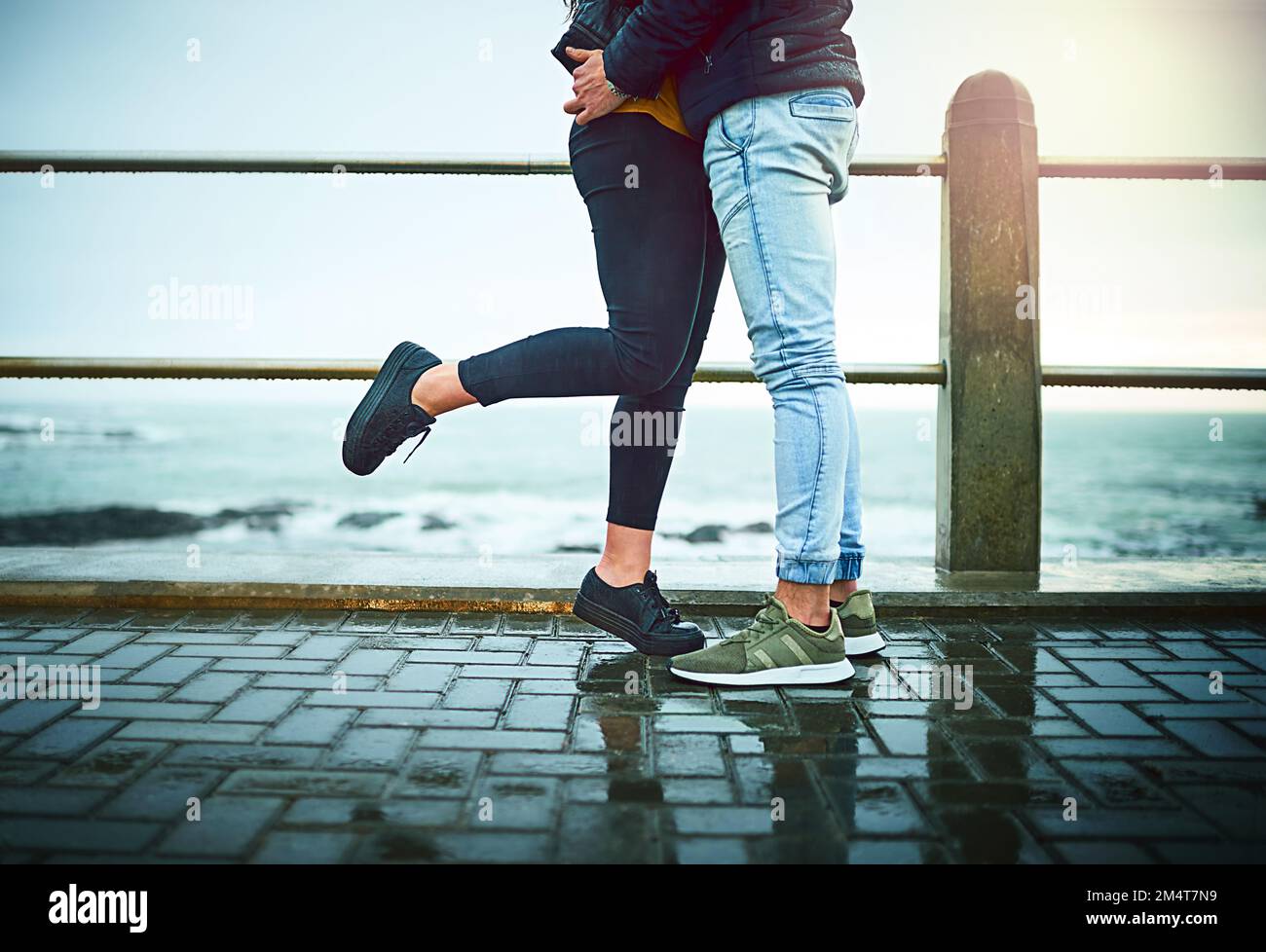 Swept up in love. a young couple embracing on a romantic day outdoors ...