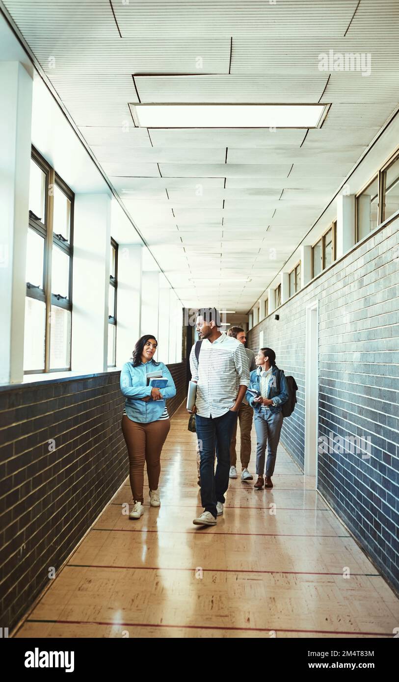 What have you got next. Full length shot of a group of university ...