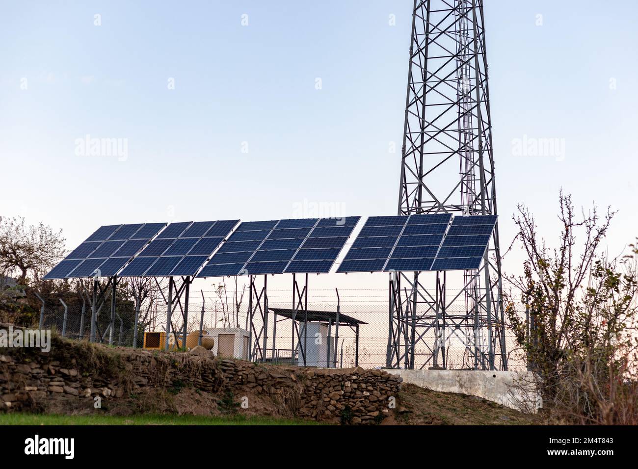 A cellular tower in the remote area powered by the solar panels Stock ...
