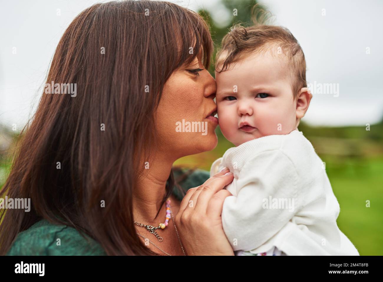 Nothing but the purest of love. a mother bonding with her adorable baby ...