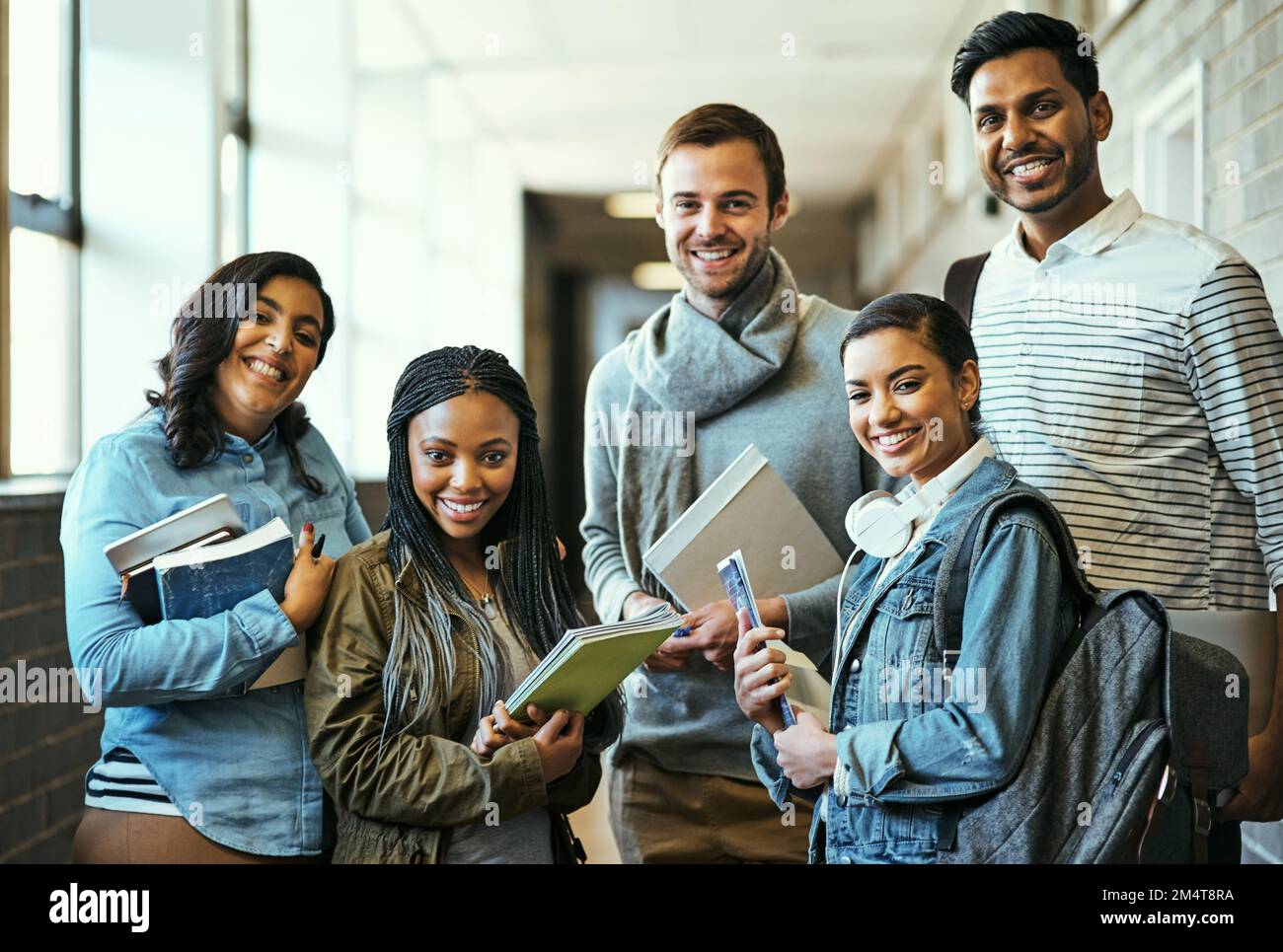 Were between classes. Cropped portrait of a group of university ...
