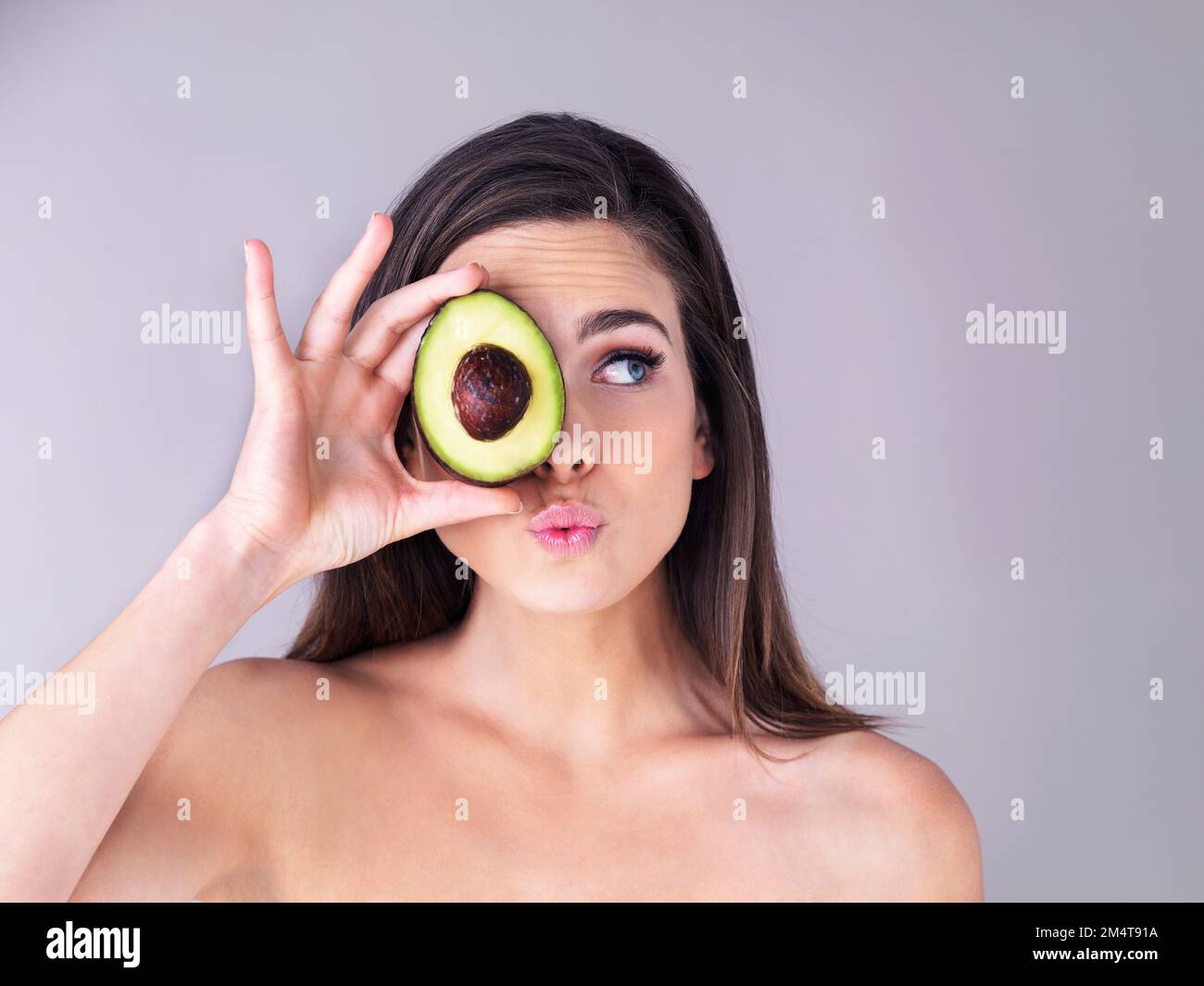 Itll give you that all over glow. Studio shot of an attractive young ...