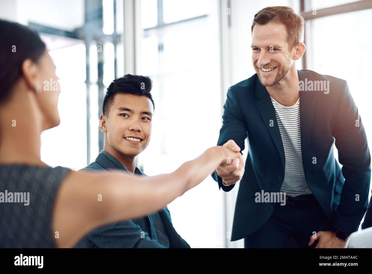 Welcome to the company. businesspeople having a meeting in a boardroom ...