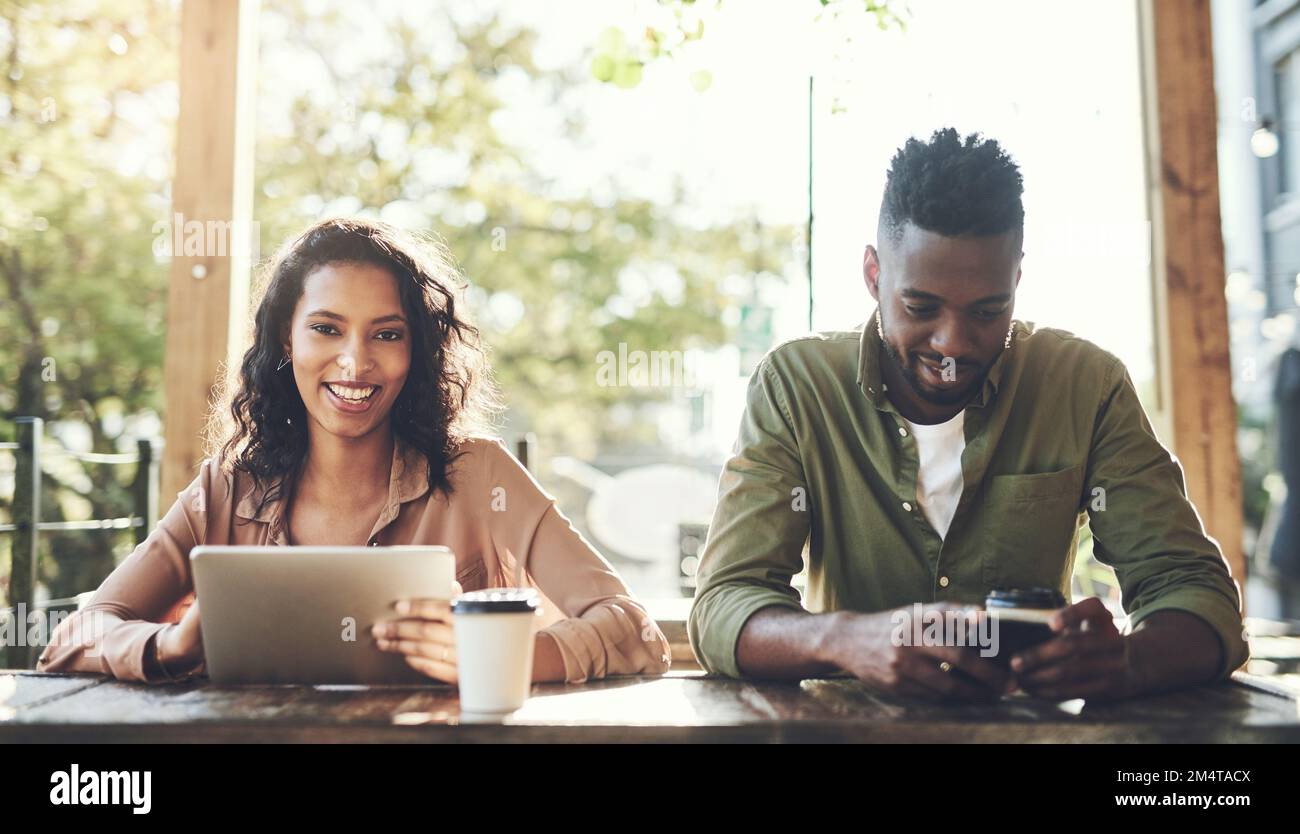 They have their menu in digital form. two young people using their ...