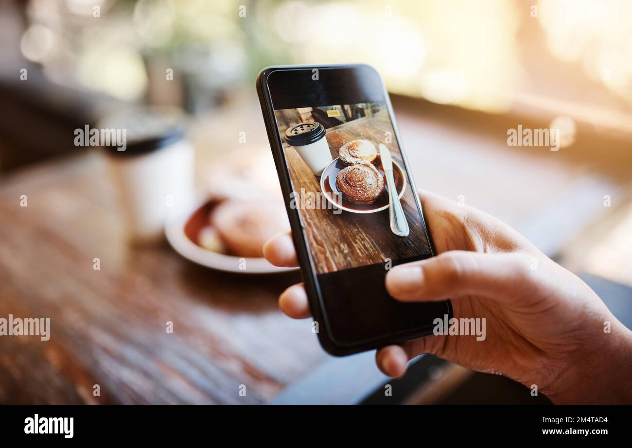 One for the page. an unrecognizable young woman taking a picture of her ...