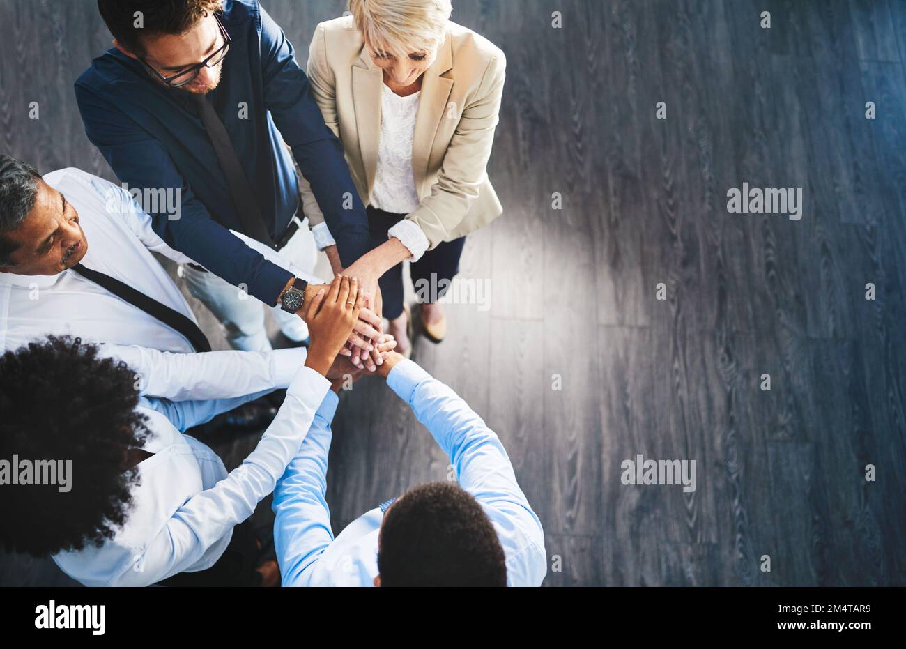 Were unstoppable when we stand together. a group of businesspeople ...