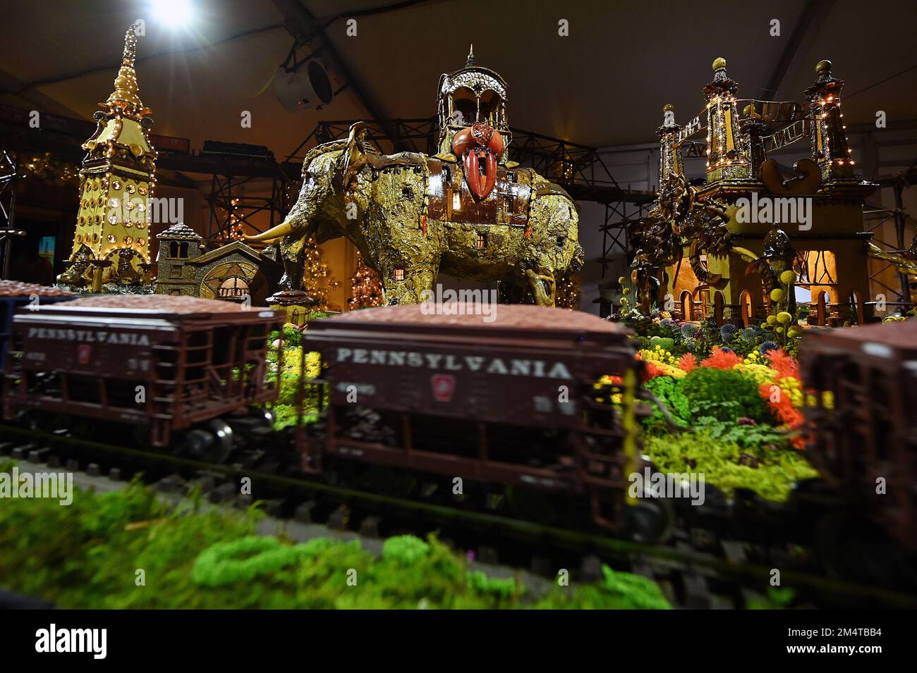A model train passes by a recreation of Elephant Colossus, which was a ...