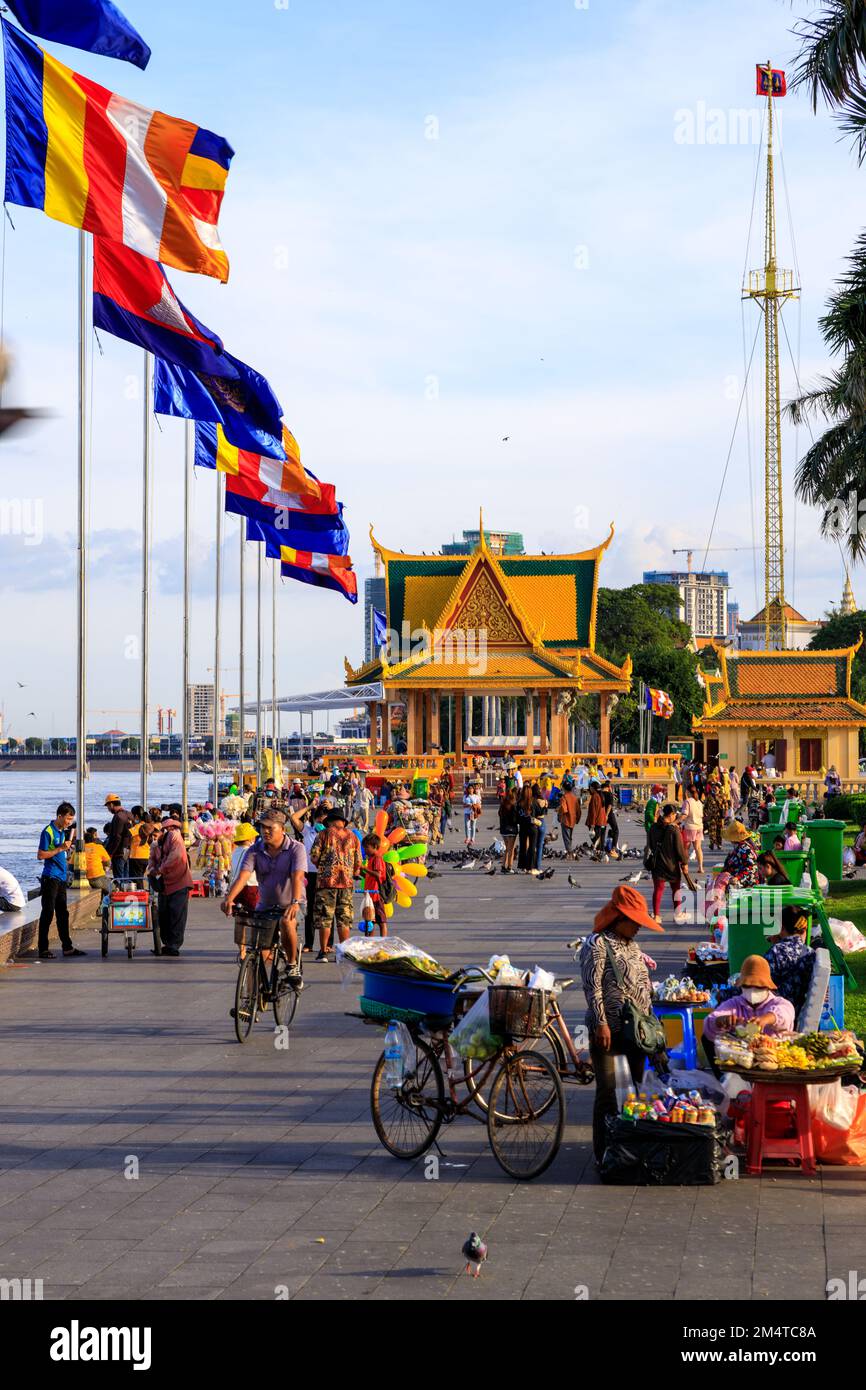 Phnom Penh, Cambodia - November 30, 2022: People walking in the evening ...