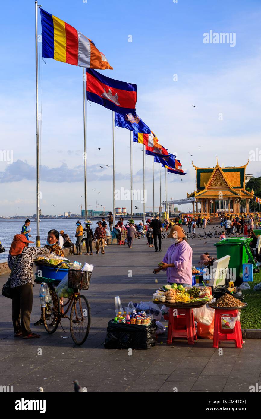 Phnom Penh, Cambodia - November 30, 2022: People walking in the evening ...