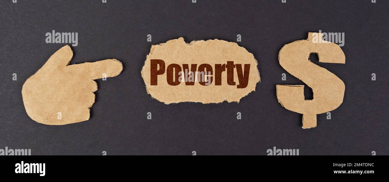 Economy and finance concept. On a black surface, a figure of a hand, a ...