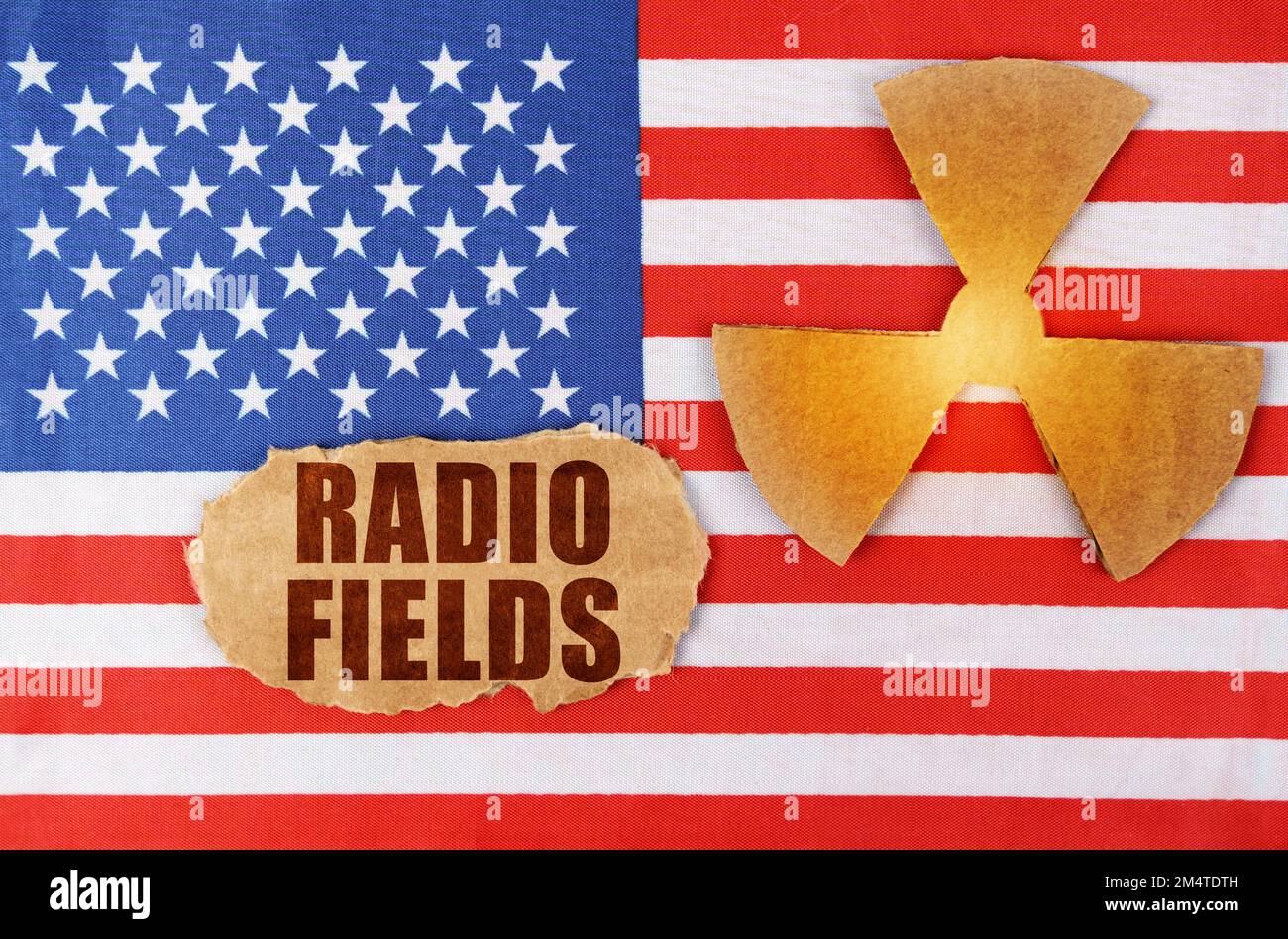 Industry and radiation concept. On the flag of the United States, there ...