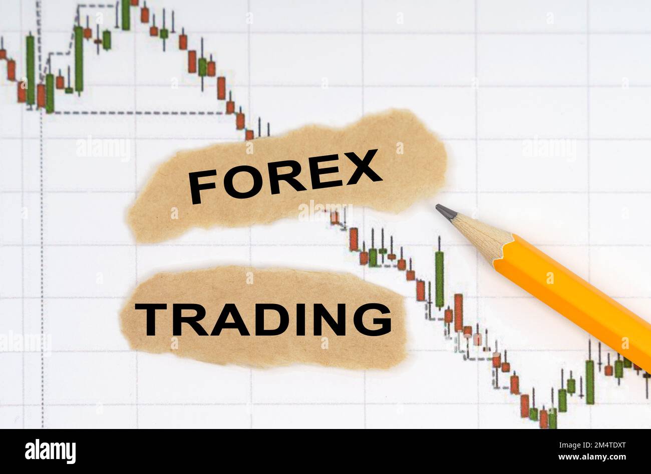 Finance and economy concept. On the table with charts of quotes are a ...