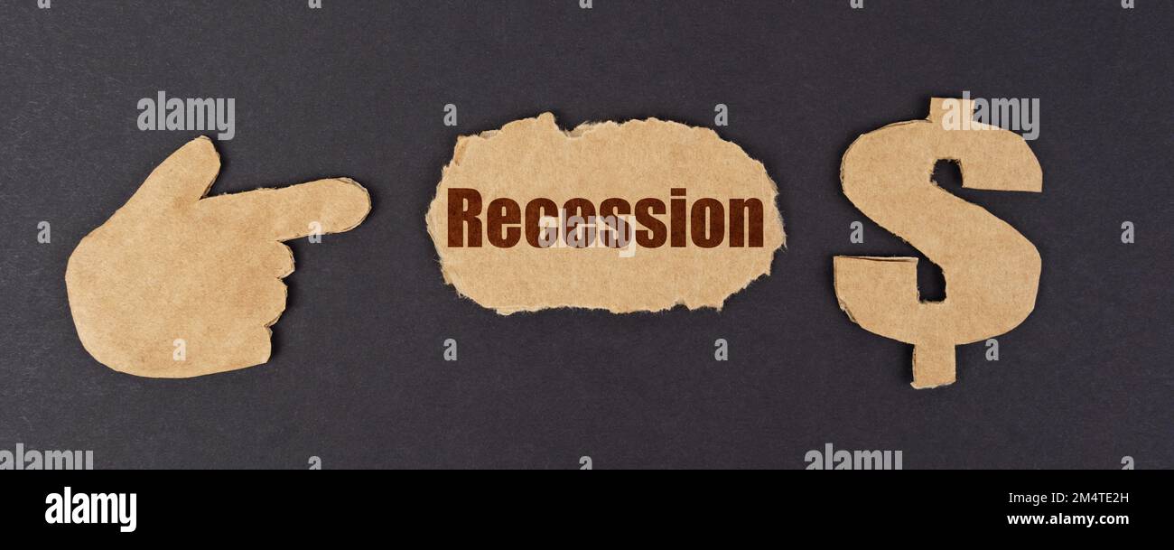 Economy and finance concept. On a black surface, a figure of a hand, a ...