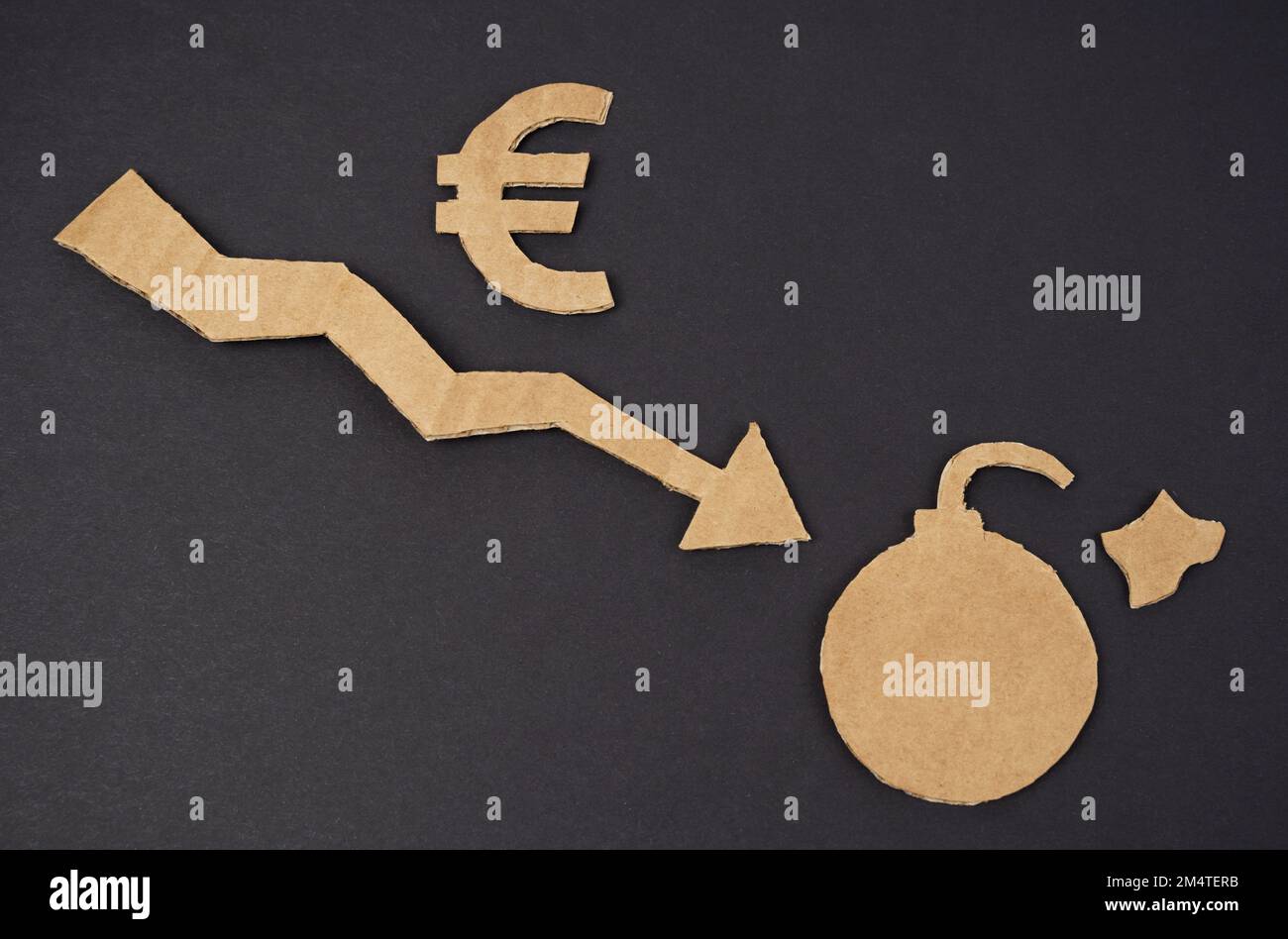 Concept of economic crisis. On a black surface, a graph with a down ...