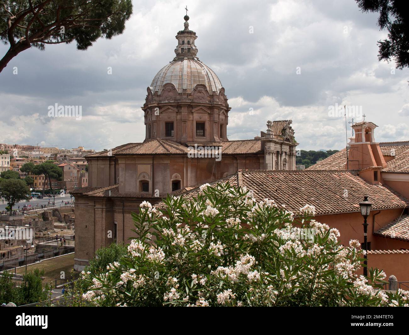 The Roman Catholic Church of Santi Luca e Martina under cloudy sky in ...