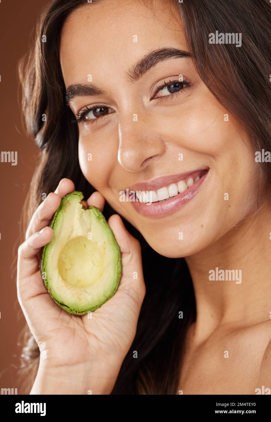 Woman, face and smile portrait with avocado for skincare beauty ...