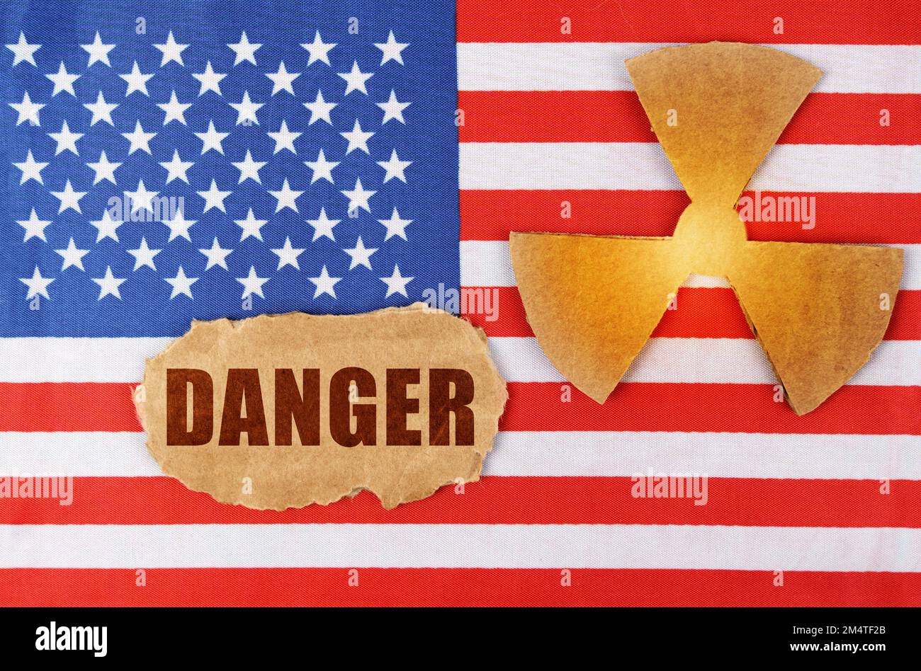 Industry and radiation concept. On the flag of the United States, there ...