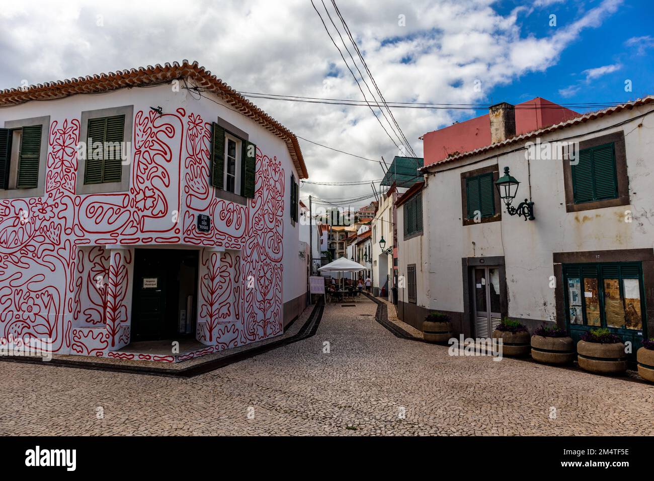 Beautiful traditional houses in Madeira near Santa Cruz, Portugal with ...