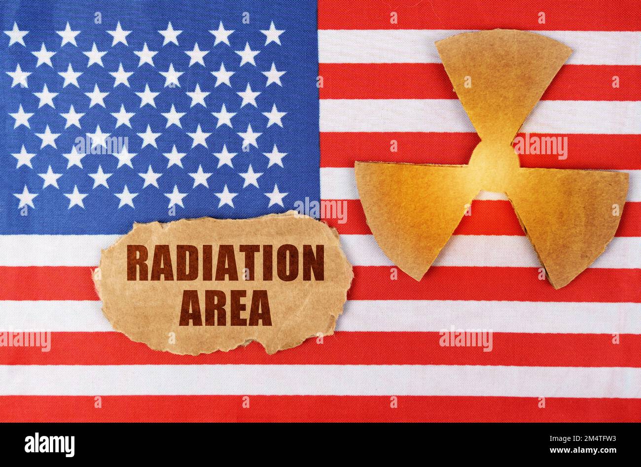 Industry and radiation concept. On the flag of the United States, there ...