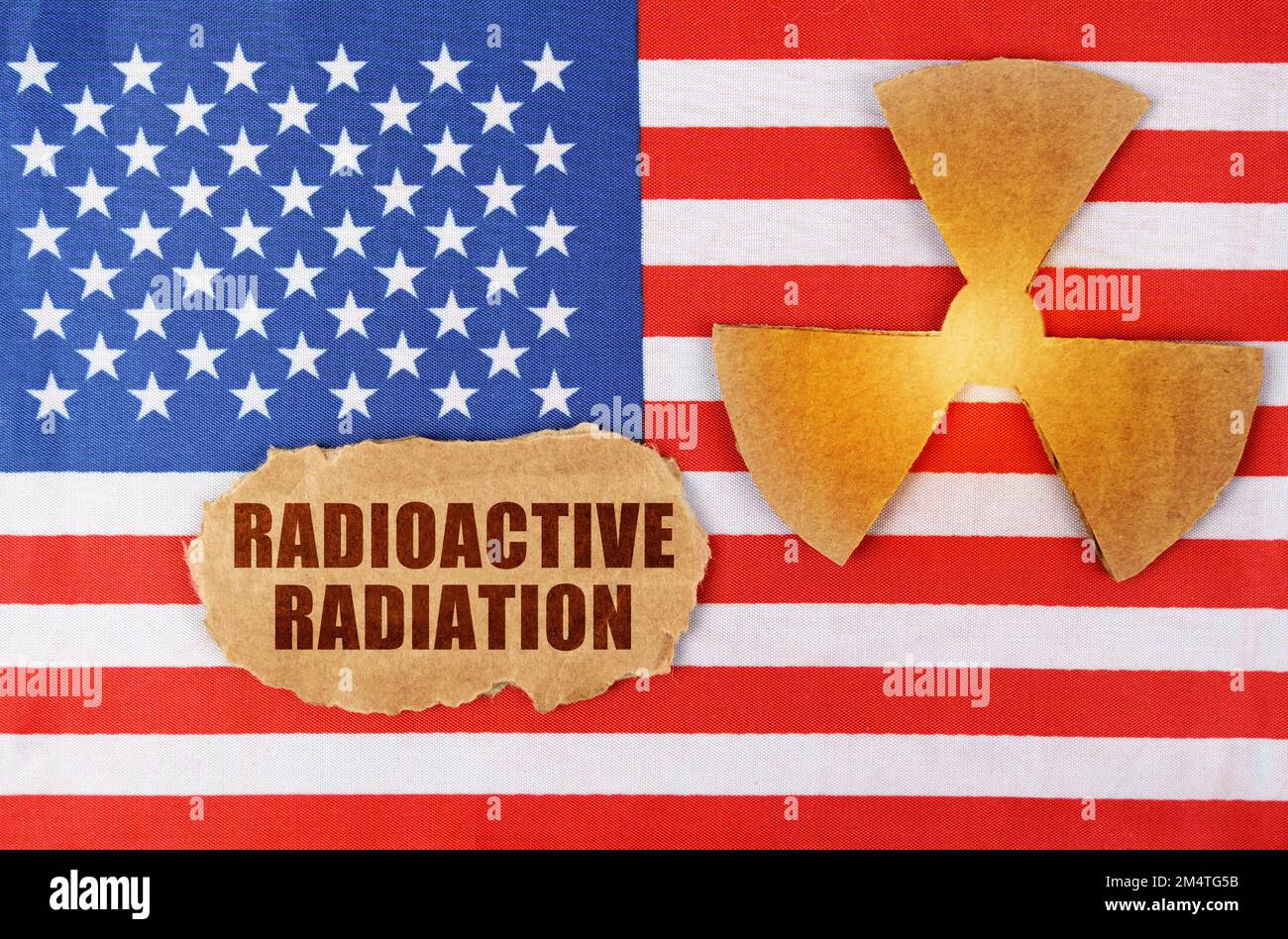 Industry and radiation concept. On the flag of the United States, there ...